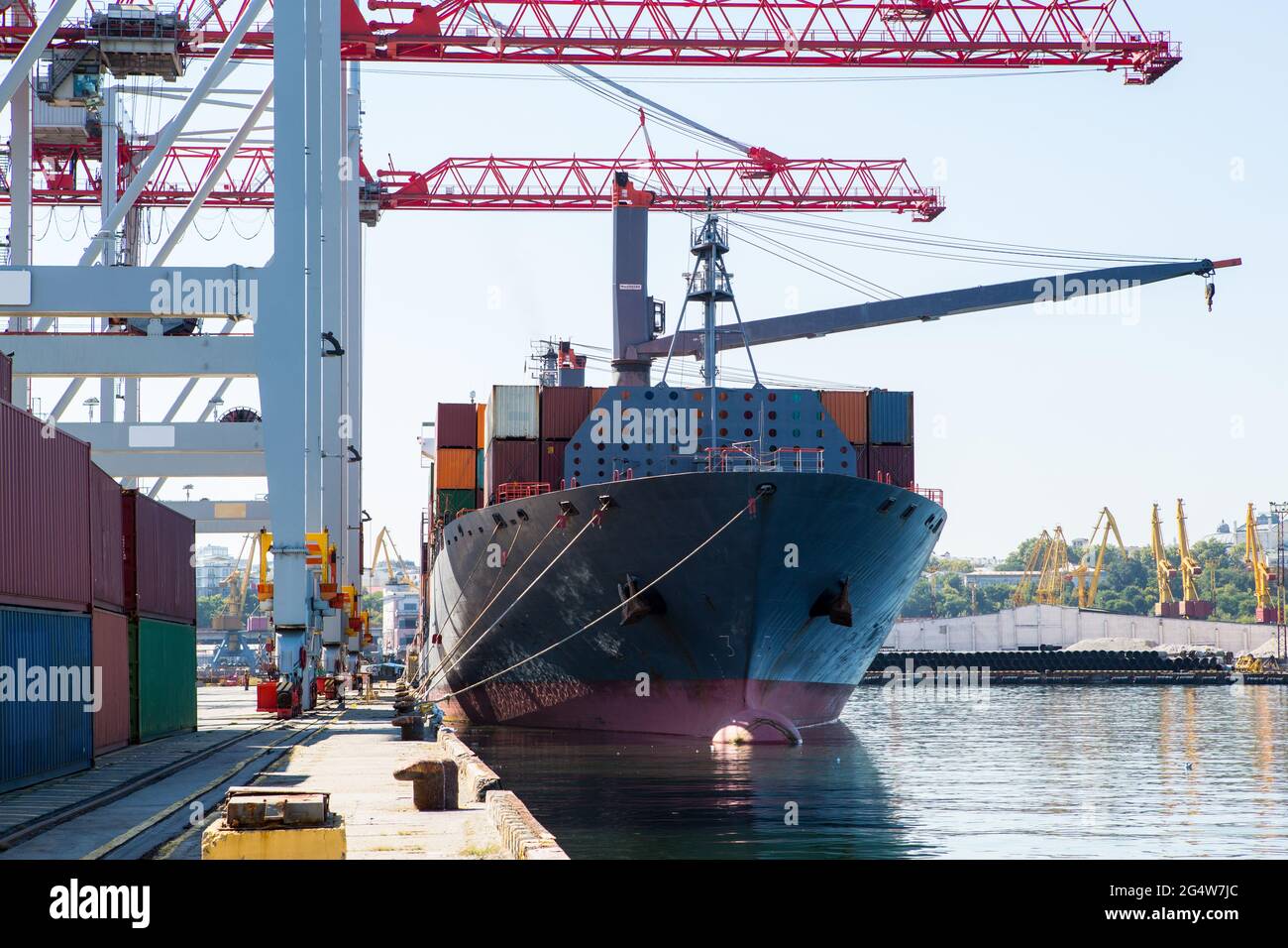 Panamax Container ship in port at container terminal. Ships of ...