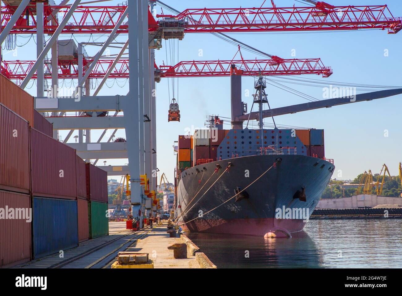Panamax Container ship in port at container terminal. Ships of ...