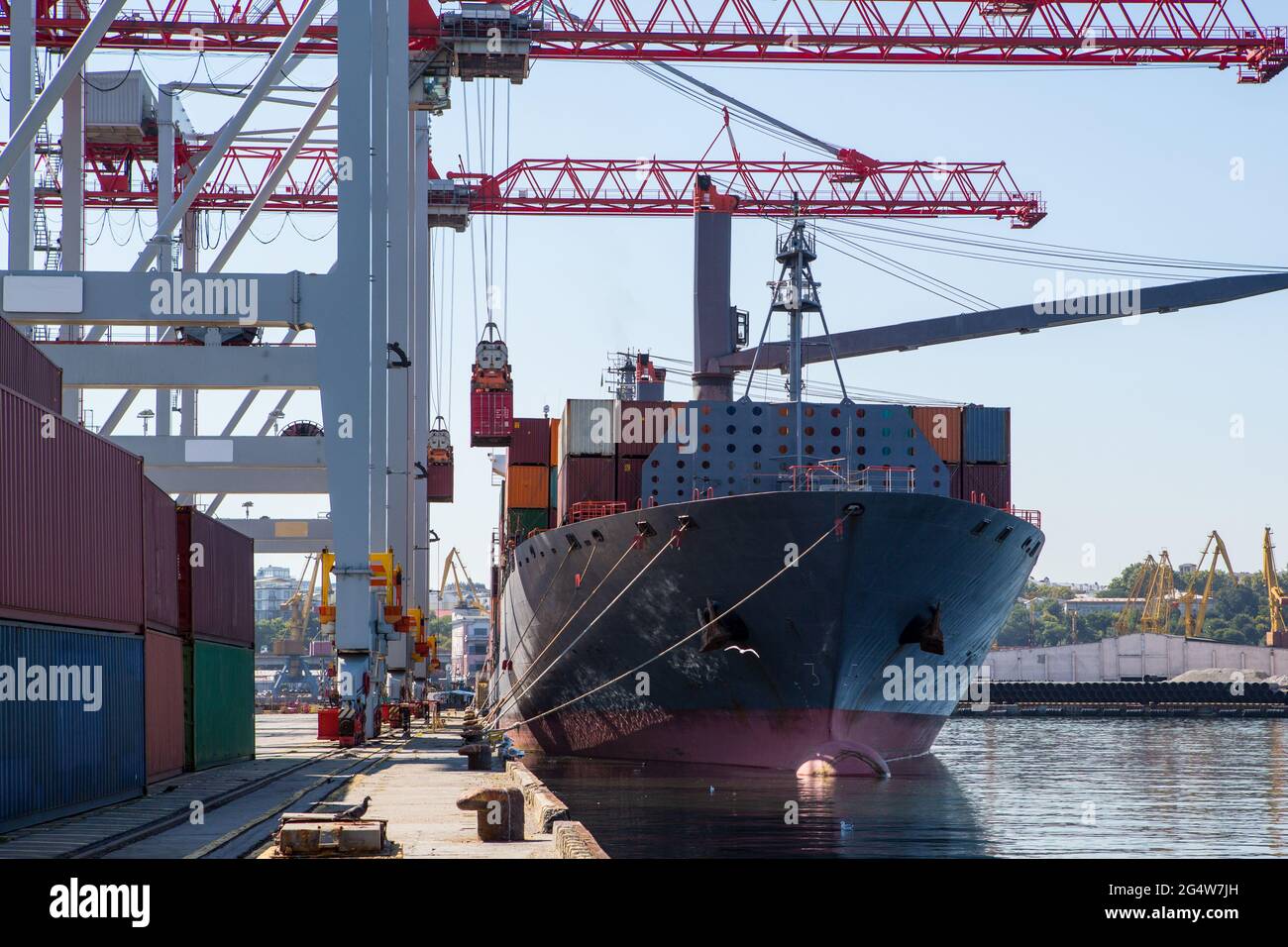Panamax Container ship in port at container terminal. Ships of ...
