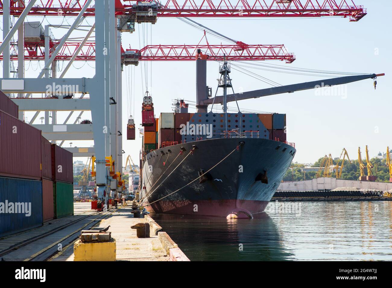 Panamax Container ship in port at container terminal. Ships of ...