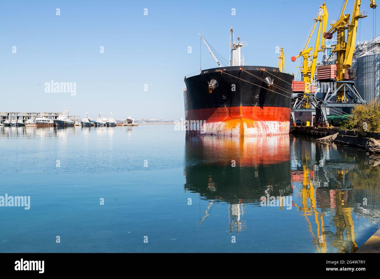 Panamax bulk carrier loaded with wheat. Ship at grain terminal. Port ...