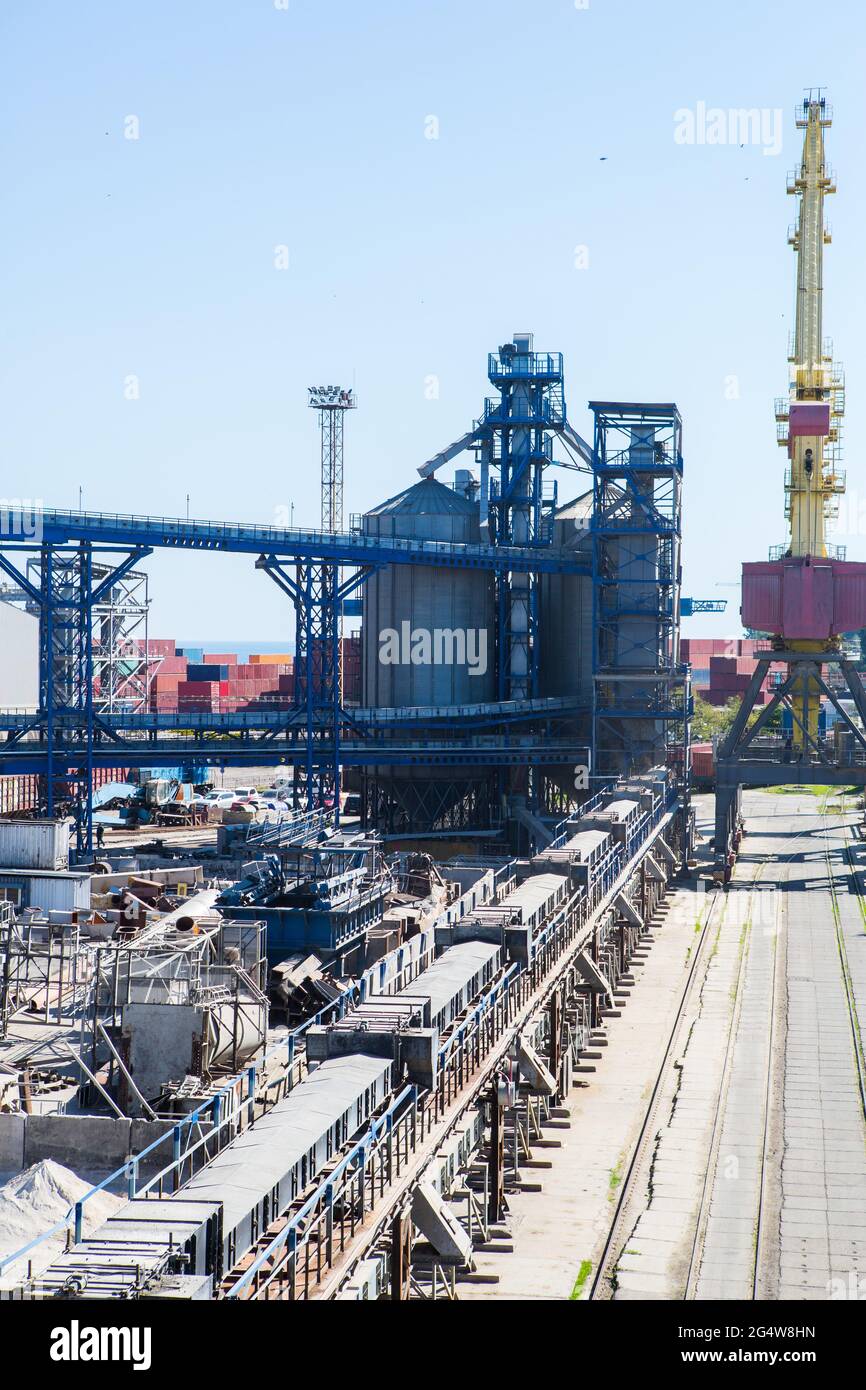Port grain elevator. Industrial sea trading port bulk cargo zone grain ...