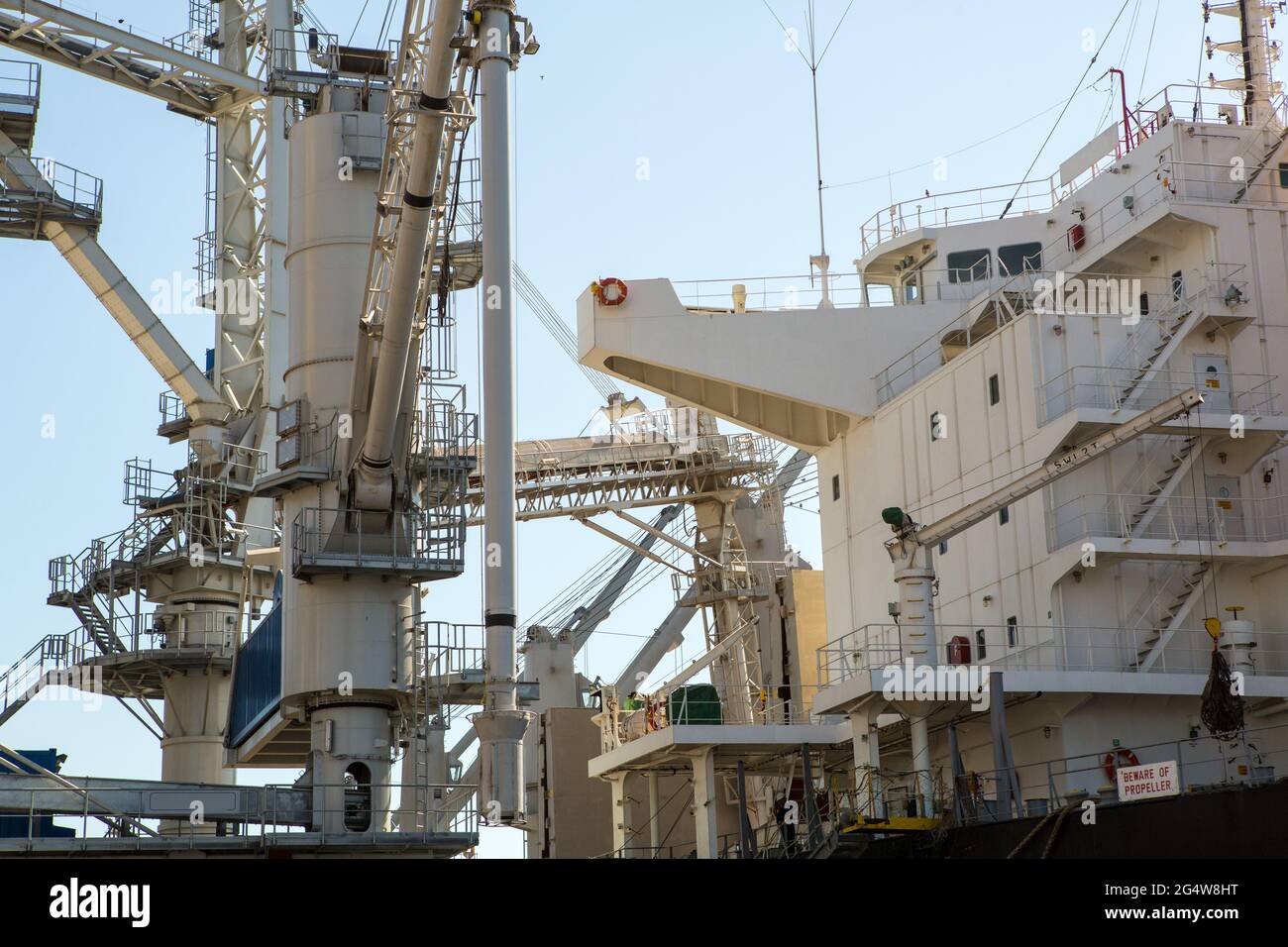 Port grain elevator close up. Industrial sea trading port bulk cargo ...
