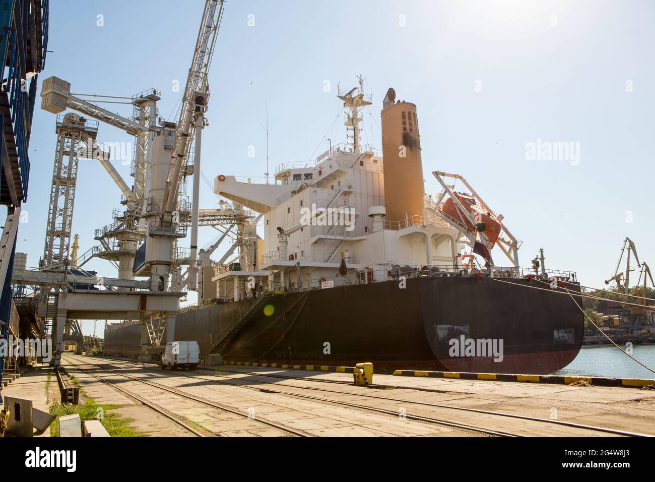 Panamax bulk carrier loaded with wheat. Ship at grain terminal. Port ...