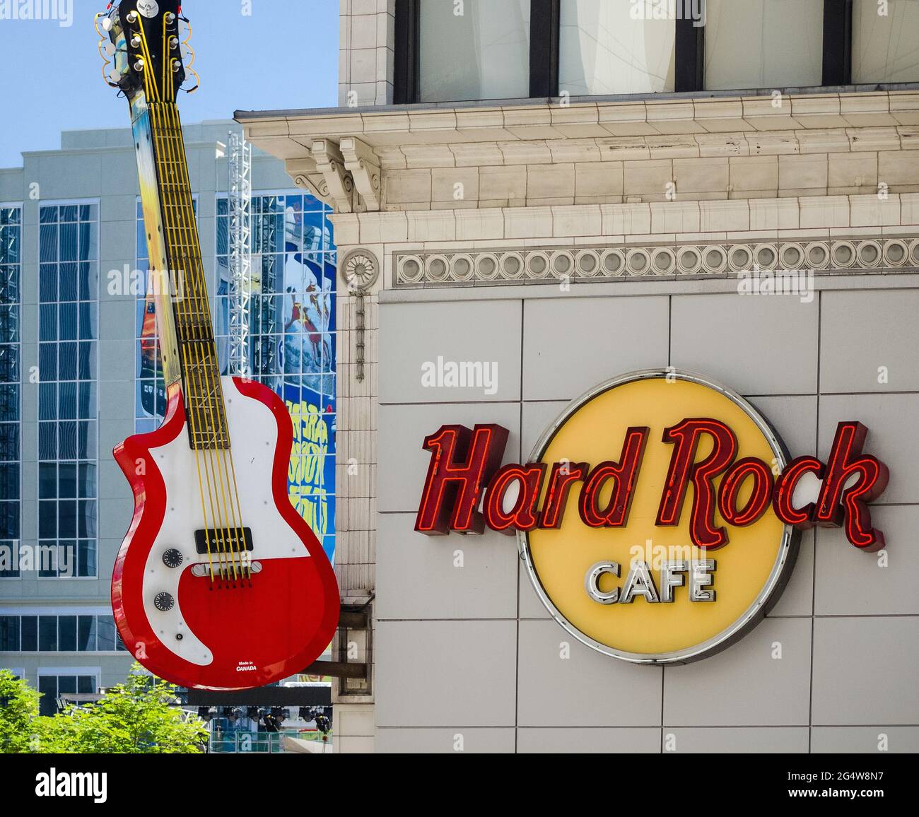 The exterior of the Hard Rock CafÈ and the guitar-shaped neon sign ...