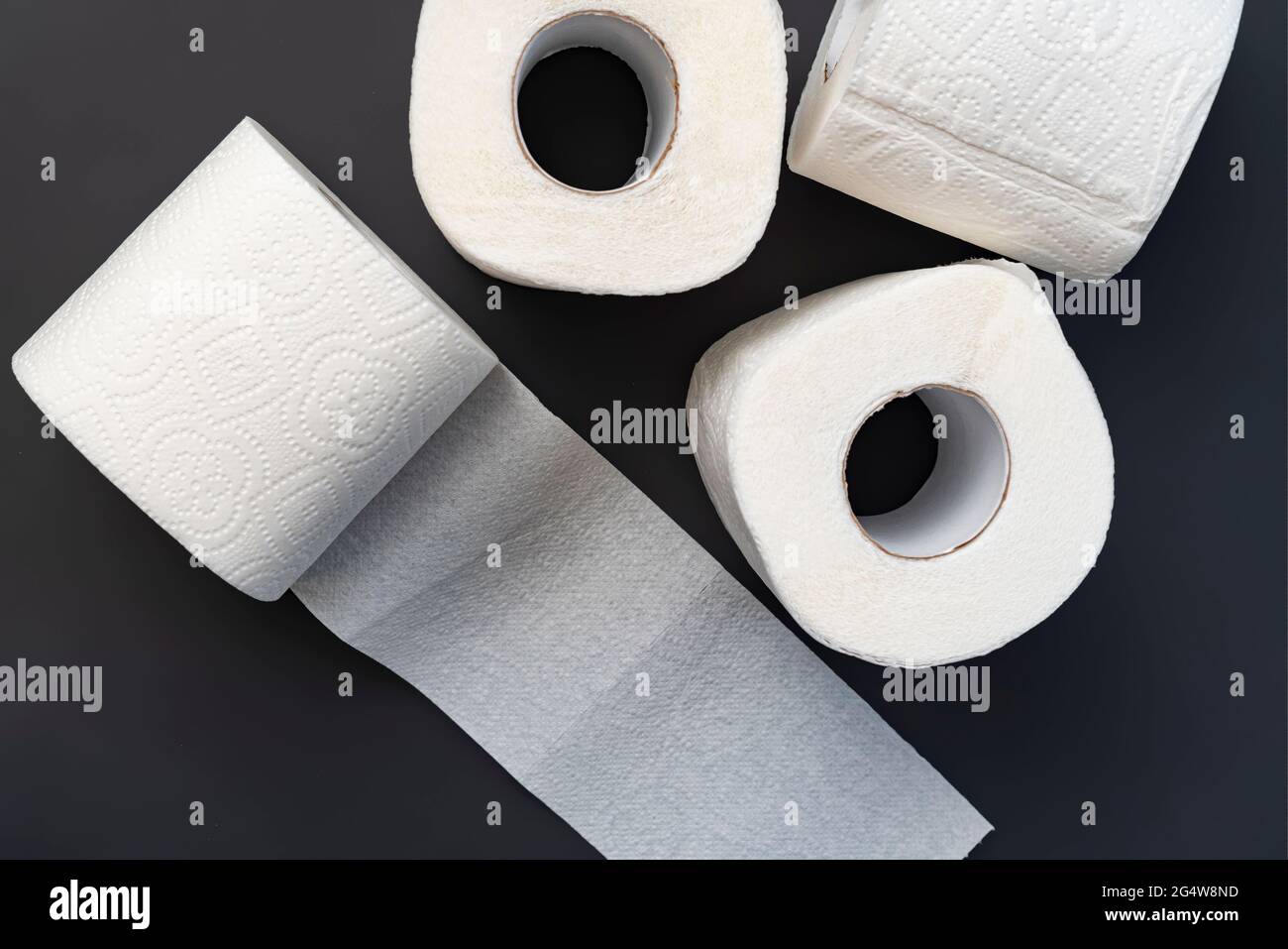 close up toilet paper rolls stack isolated Stock Photo - Alamy