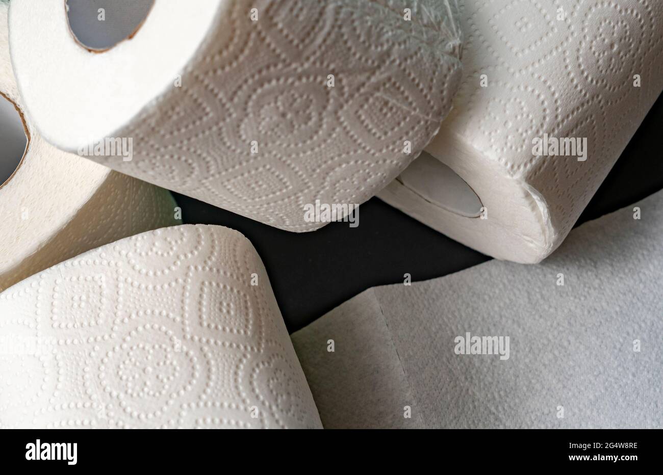 close up toilet paper rolls stack isolated Stock Photo - Alamy
