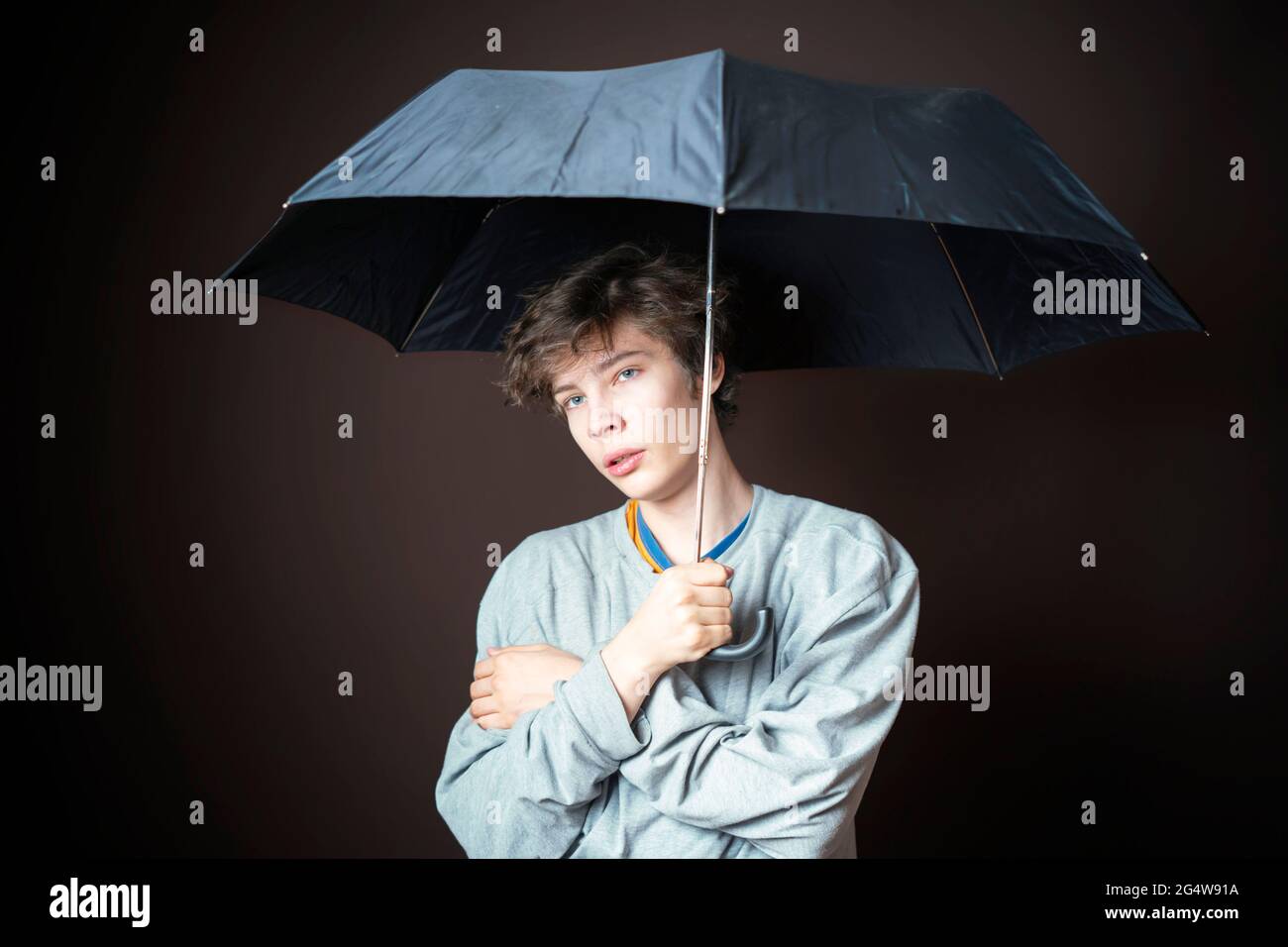 Man in the rain angry hi-res stock photography and images - Alamy