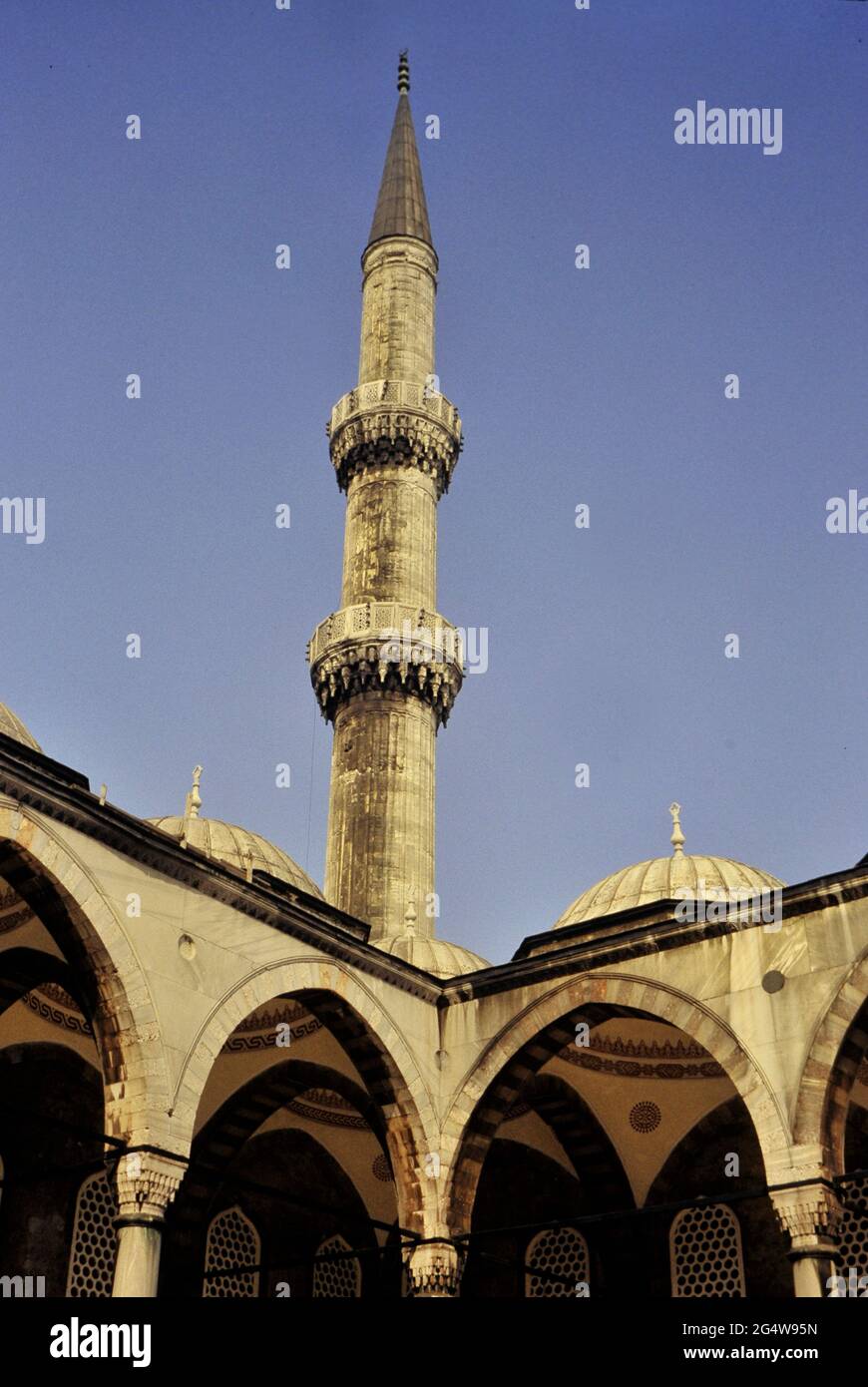 tall stone thin tower on a mosque in turkey Stock Photo - Alamy