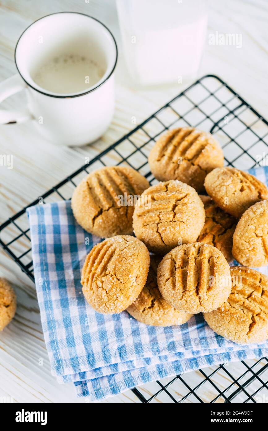 peanut butter cookies on a black wire rack. homemade baking Stock Photo ...