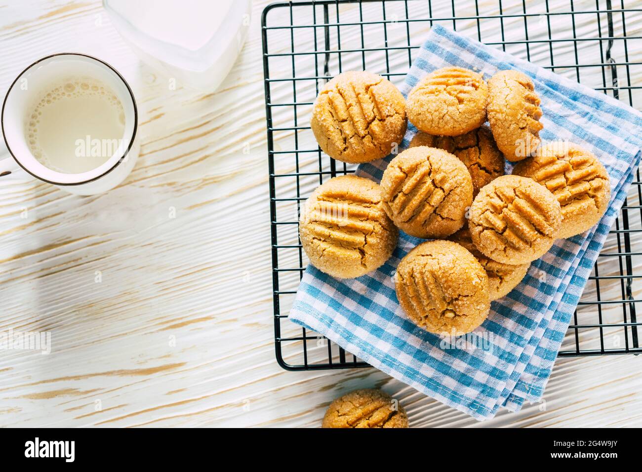 peanut butter cookies on a black wire rack. homemade baking Stock Photo ...