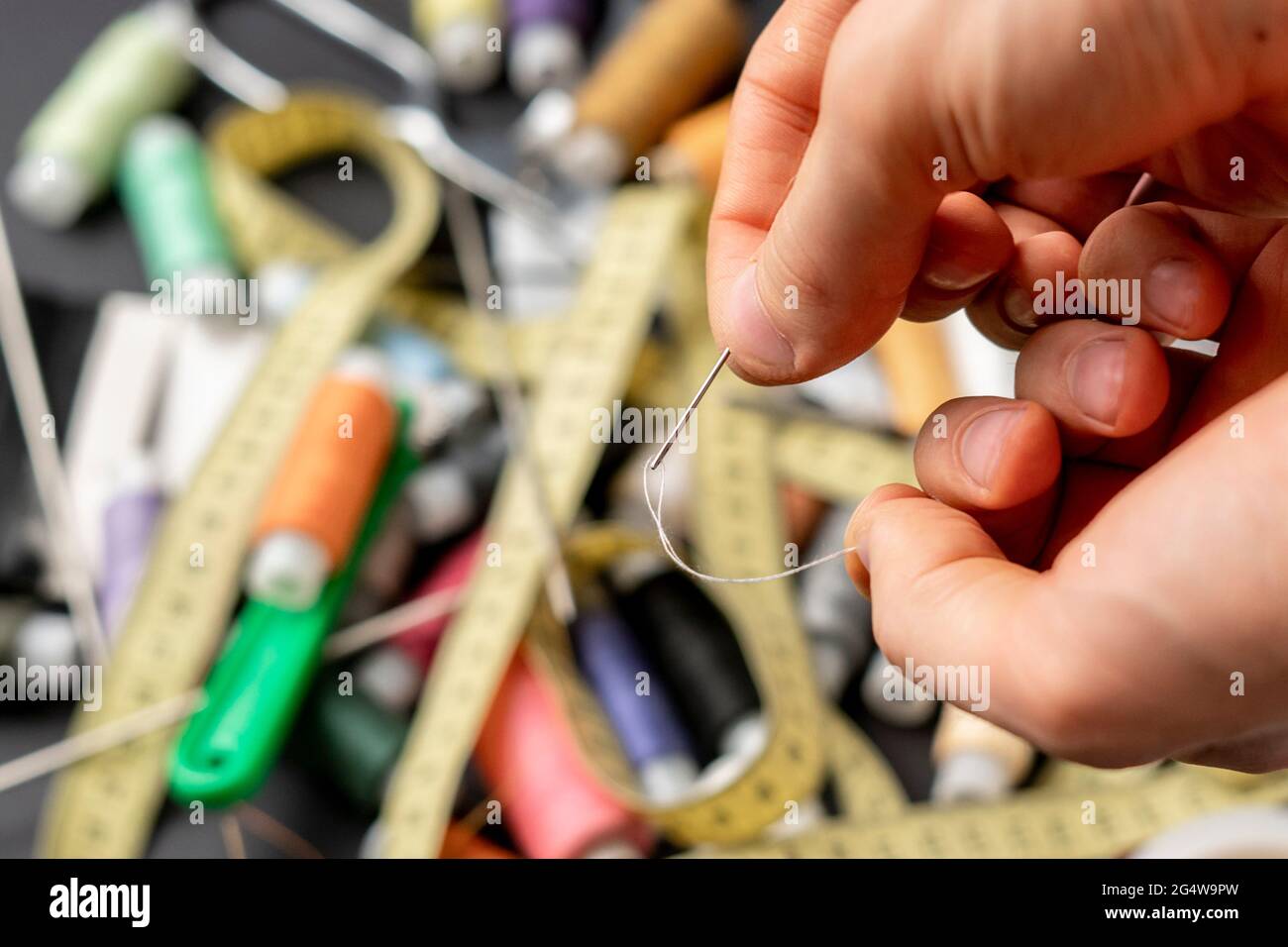 Hand hold needle sew hi-res stock photography and images - Alamy