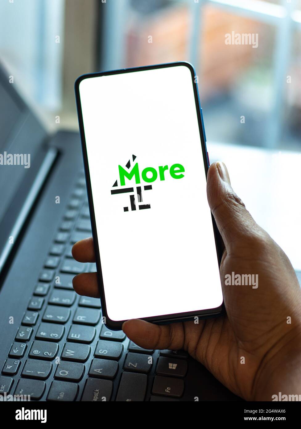 More4 logo on phone screen stock image Stock Photo - Alamy