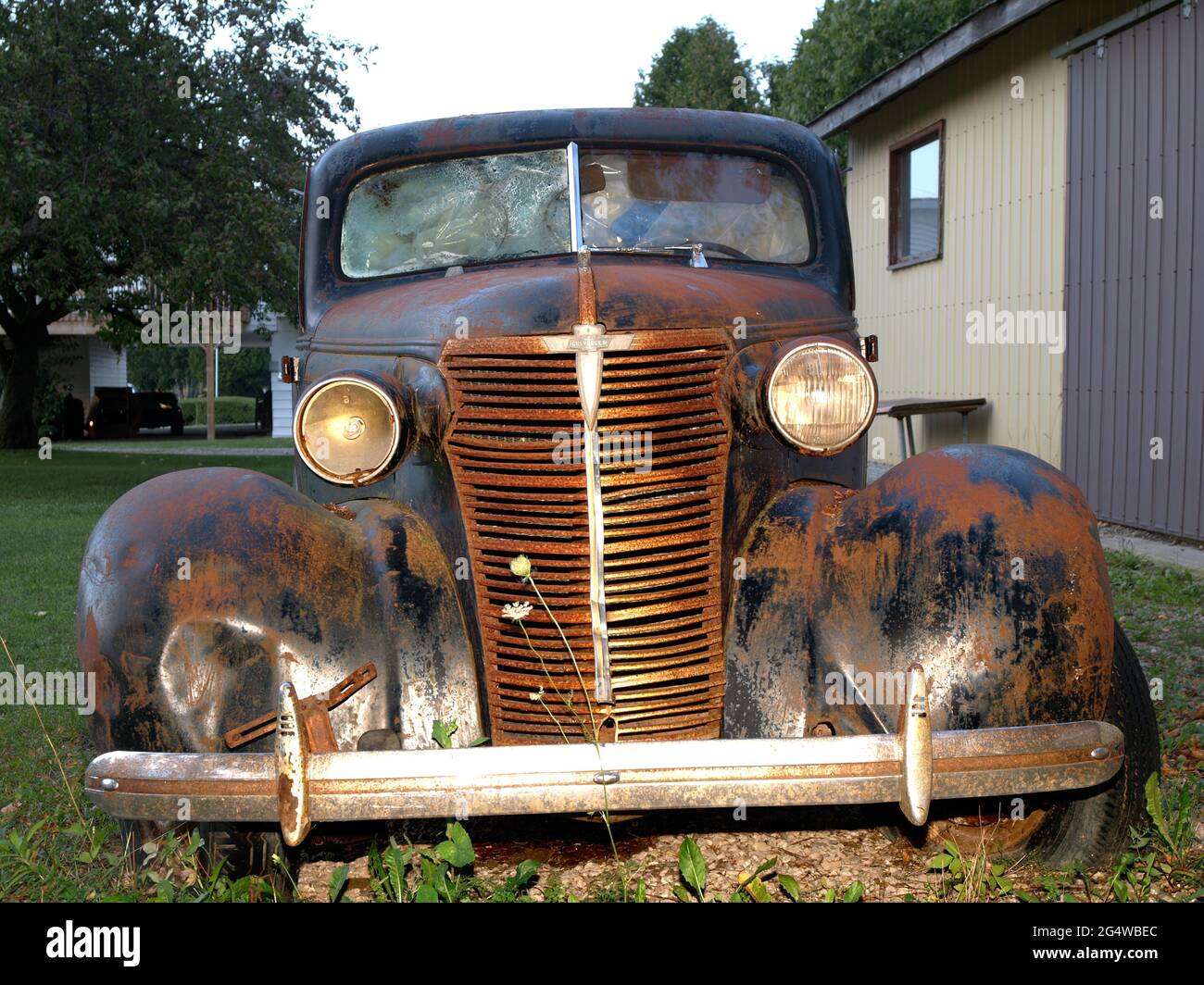 Abandoned wreck of old car Stock Photo - Alamy