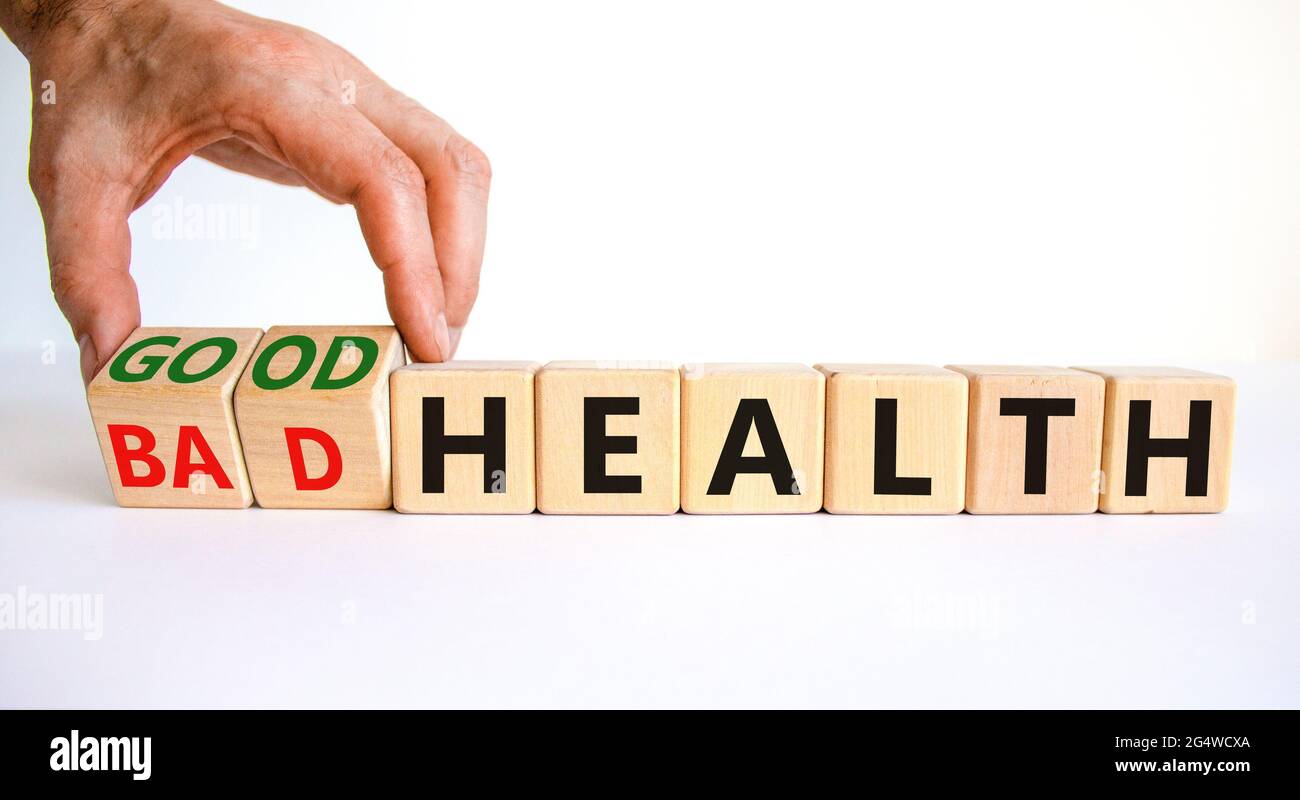 Good or bad health symbol. Doctor turns wooden cubes and changes words ...