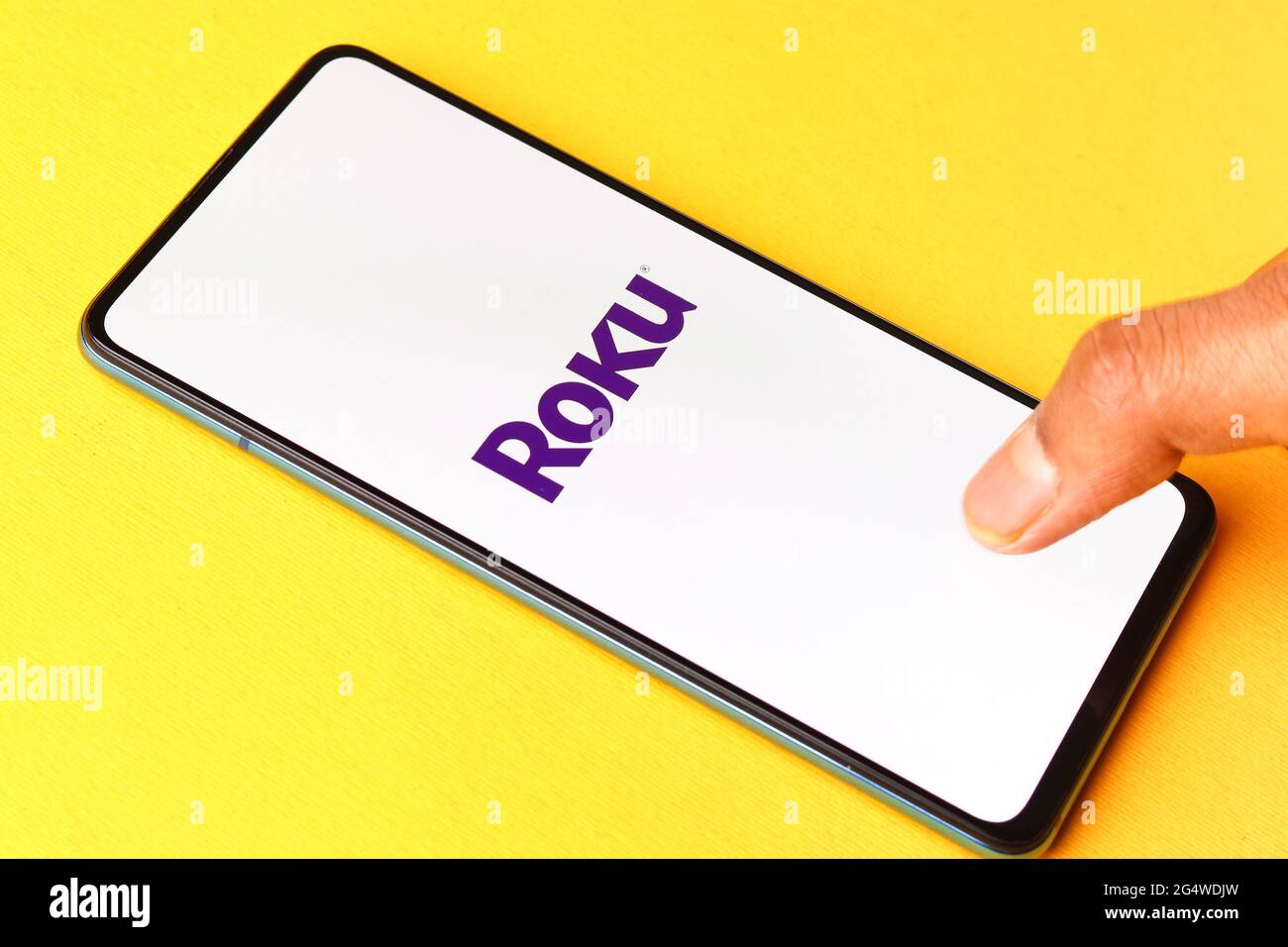 Roku tv logo on phone screen stock image Stock Photo - Alamy
