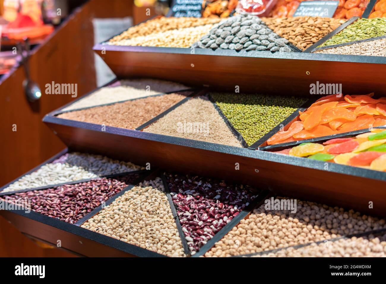 counter with rows of different grains in the market store Stock Photo ...