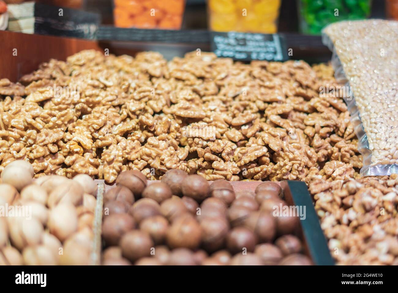 counter with organic nuts in vegan market Stock Photo - Alamy