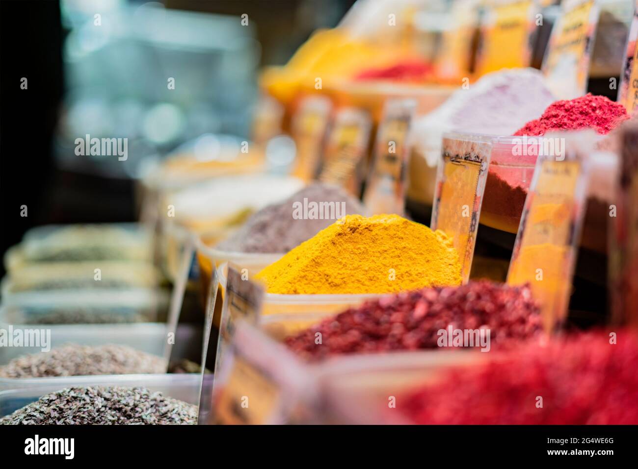 close up counter with various spices in supermarket Stock Photo - Alamy