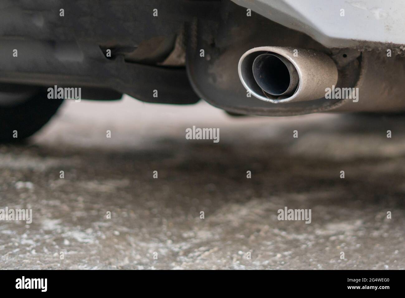 close up exaust pipe of a car releasing gas Stock Photo - Alamy