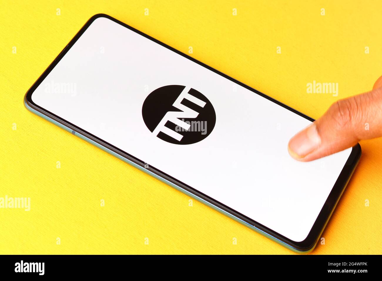 TNT tv logo on phone screen stock image Stock Photo - Alamy