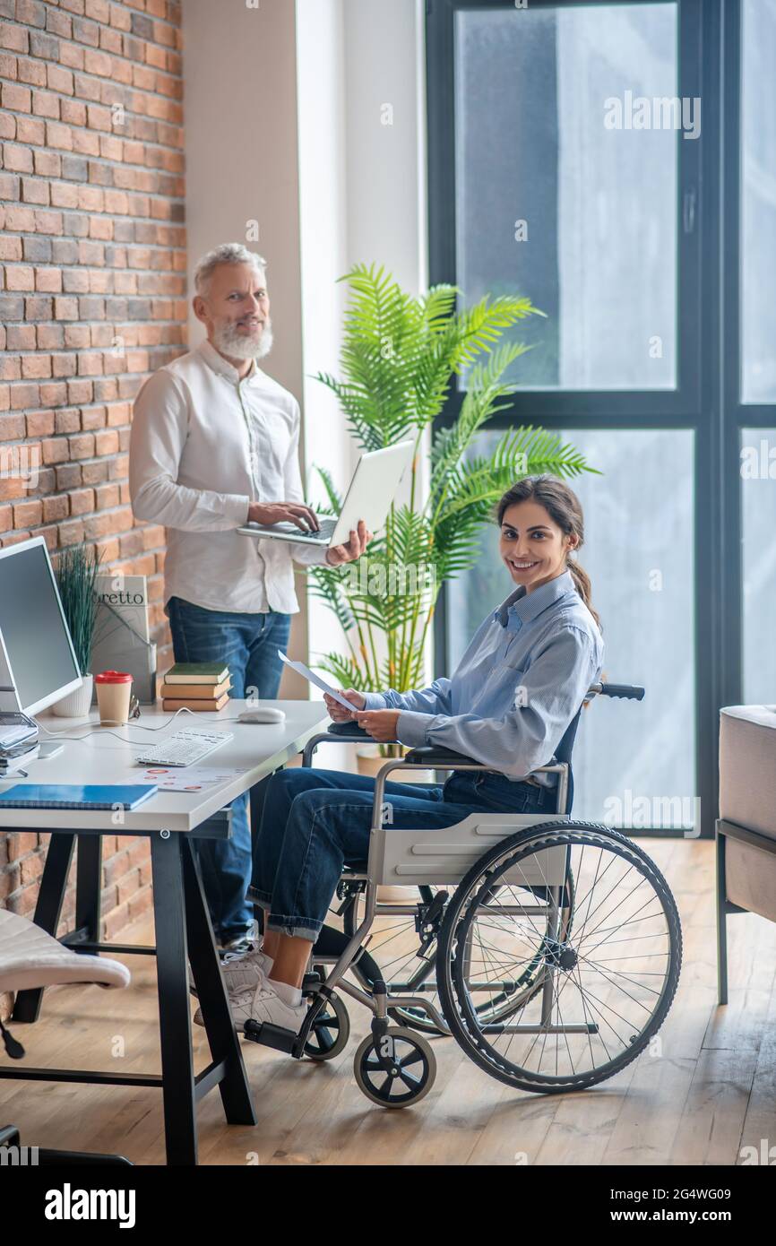 Disabled woman busy place hi-res stock photography and images - Alamy