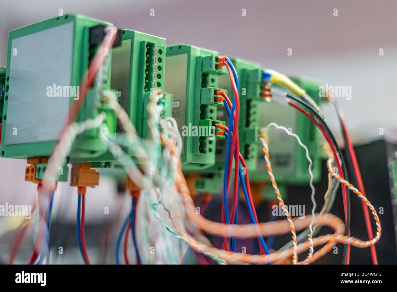 bunch of wires inserted in elctric controller Stock Photo - Alamy