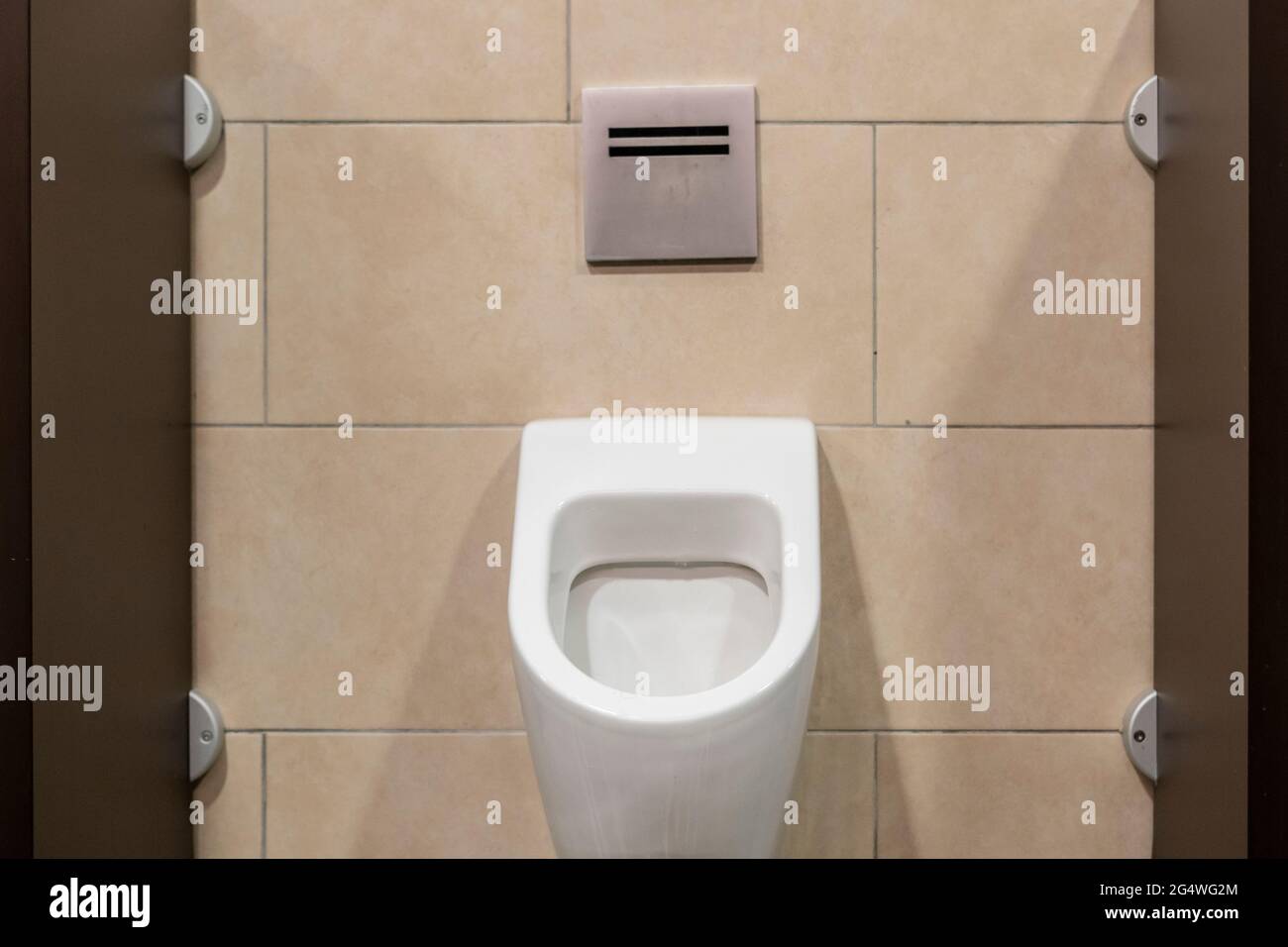 public toilet restroom in city building interior Stock Photo - Alamy