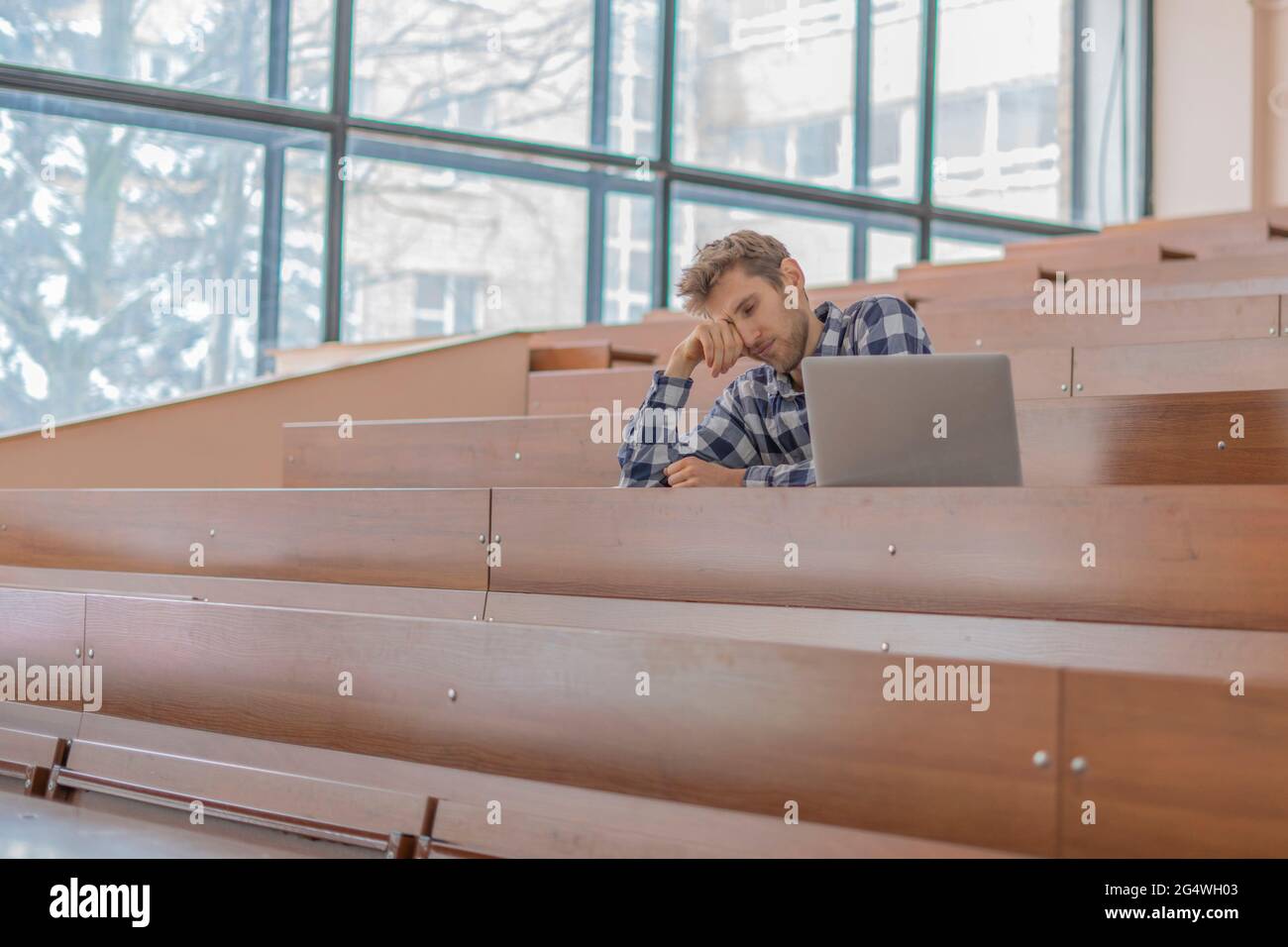tired from study student sleep in lecture hall Stock Photo - Alamy