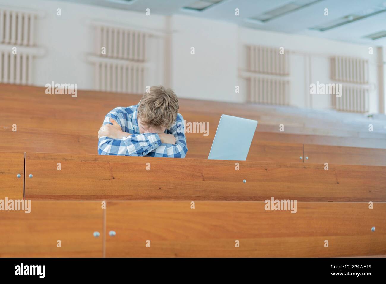 tired from study student sleep in lecture hall Stock Photo - Alamy