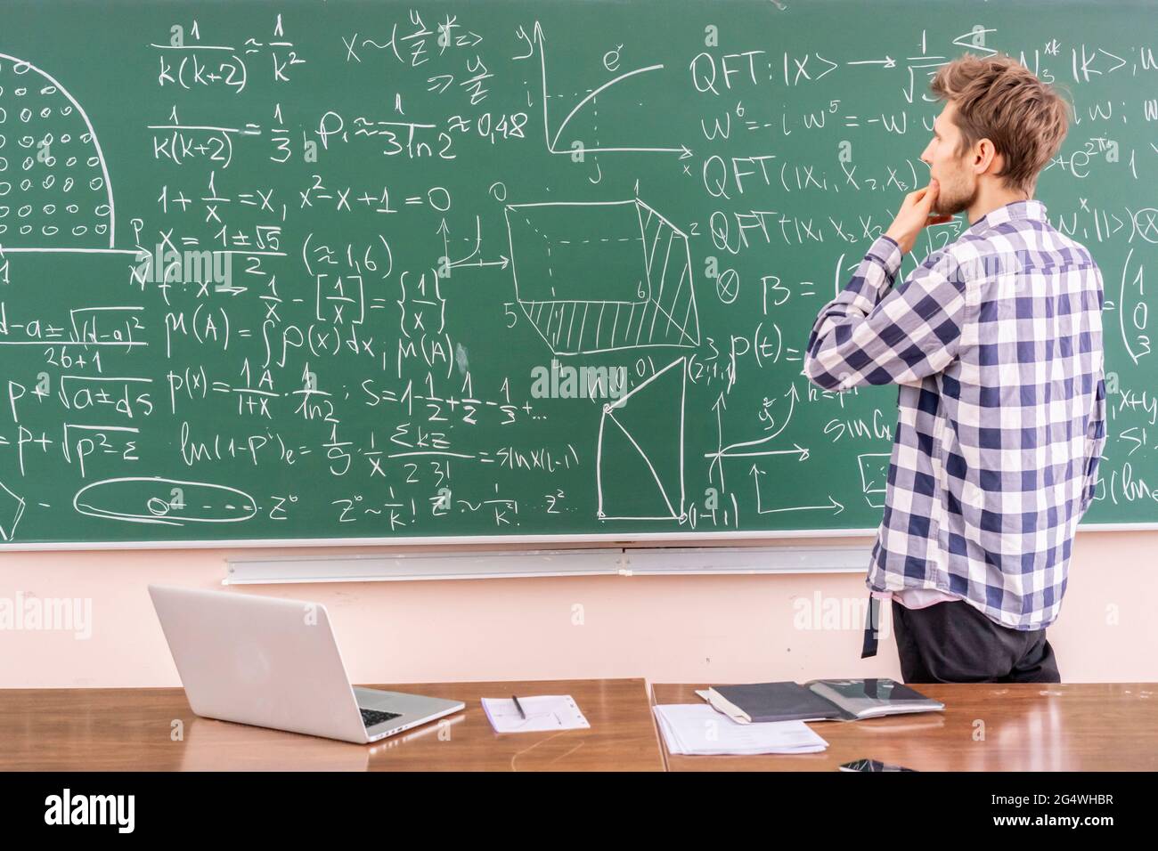 Young professor chalk board hi-res stock photography and images - Alamy