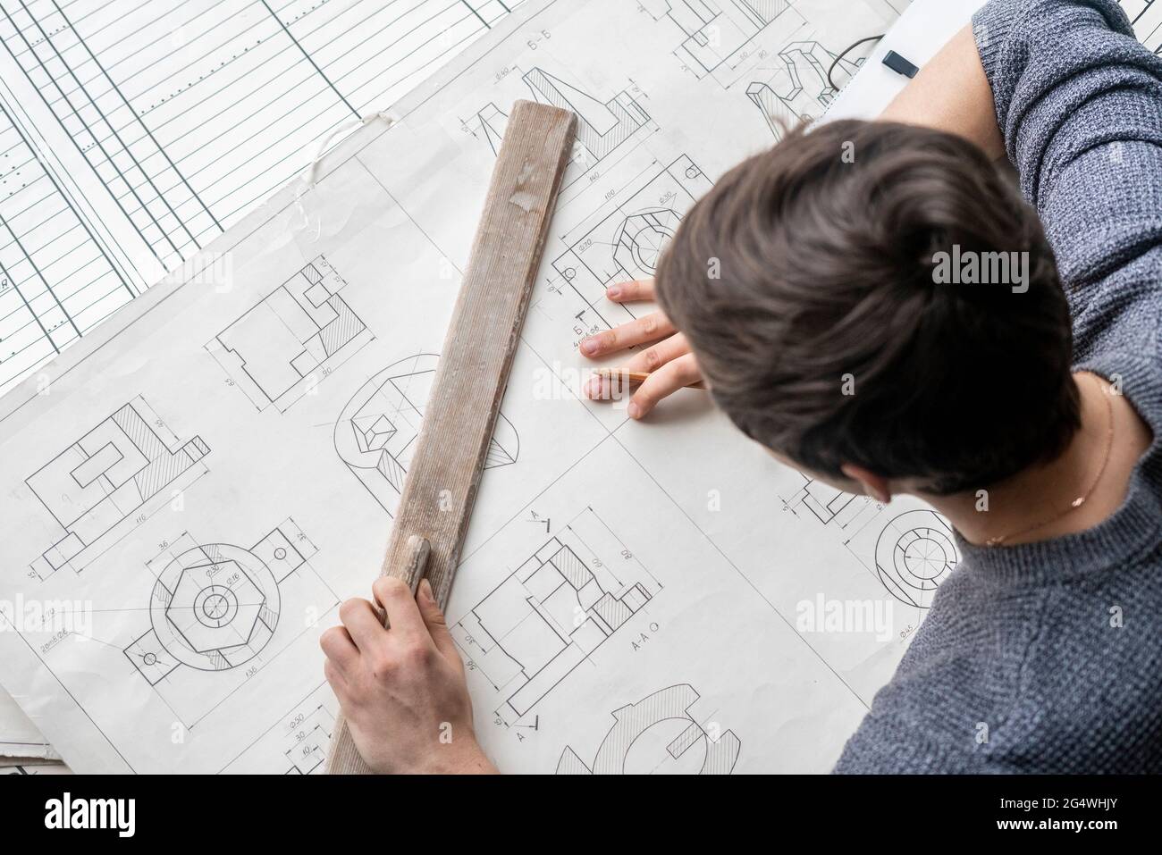overhead view of graphic designer draw a graph Stock Photo - Alamy