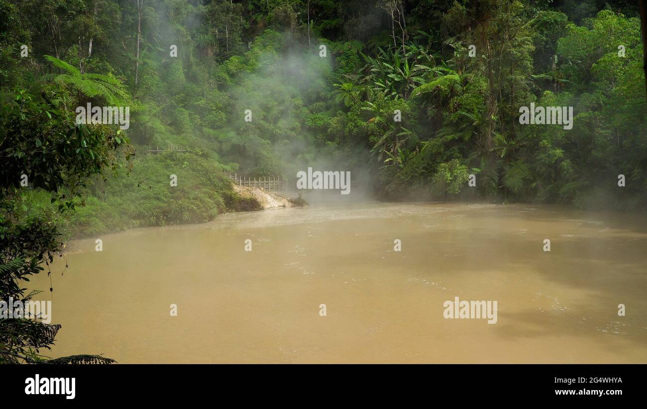 Lake near the Apo volcano in a rainforest in the mountains. Lake Agco ...