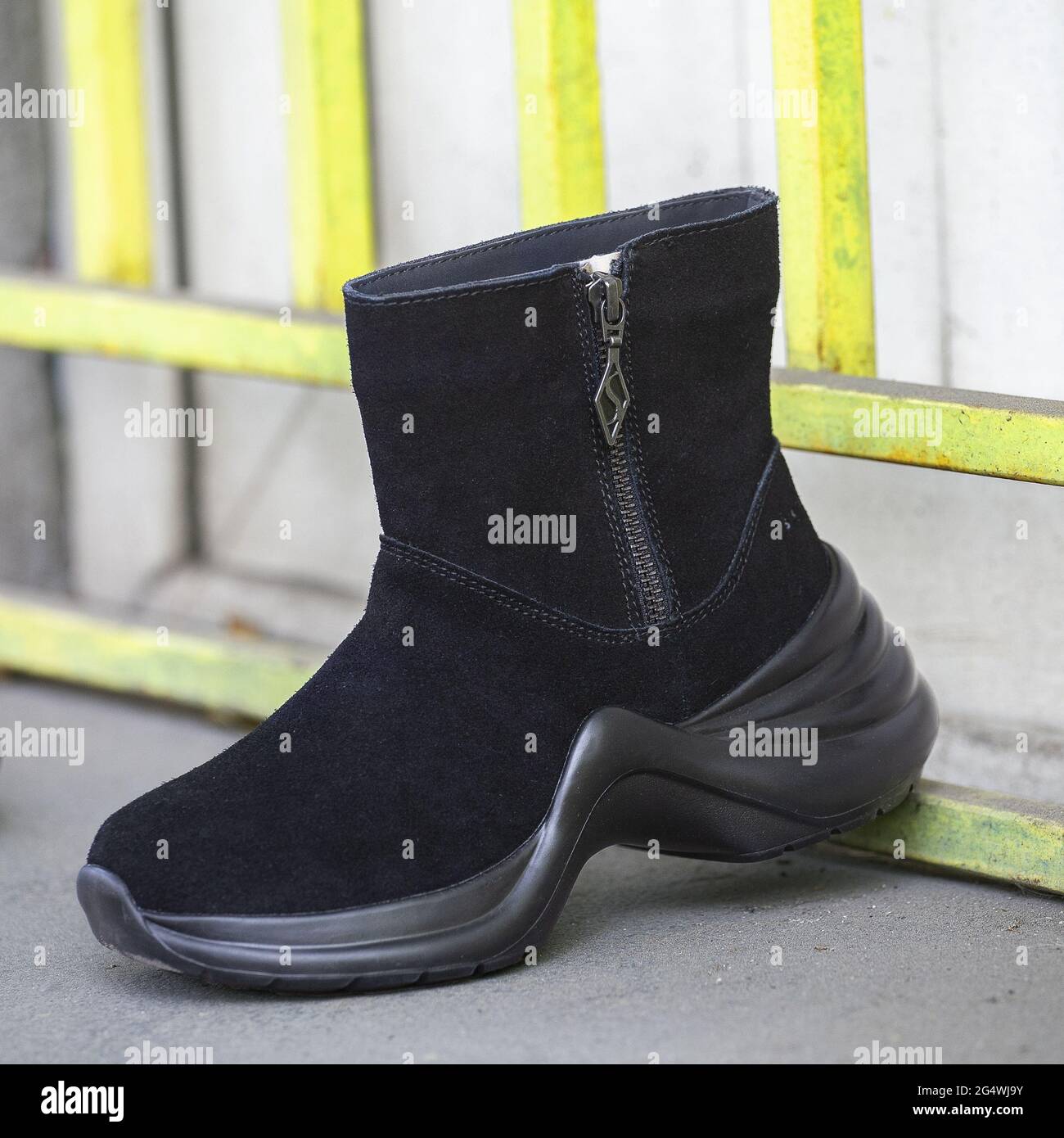 Closeup shot of a women's black semi boot Stock Photo - Alamy