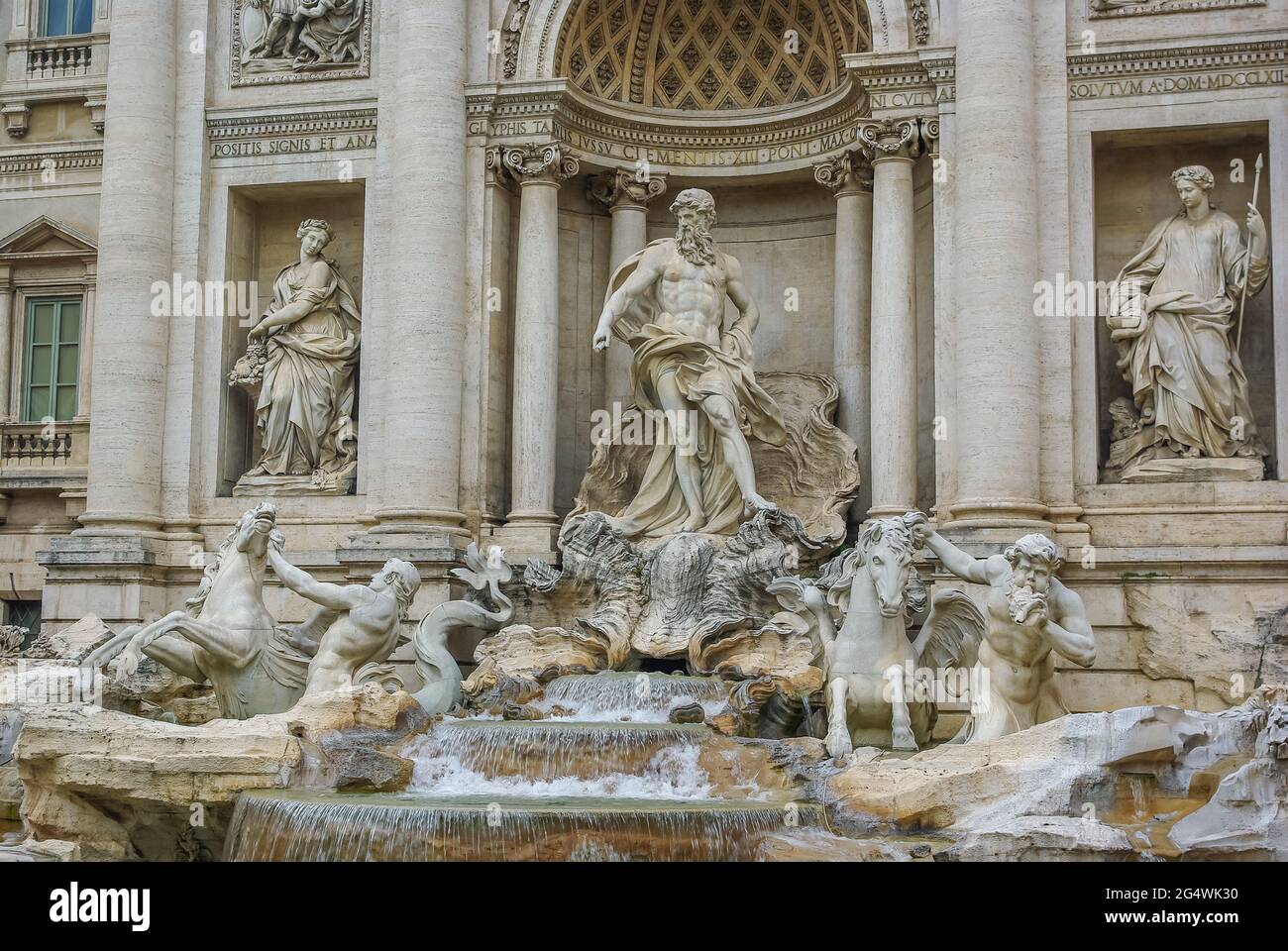 Trevi fountain in Rome, Italy. Facade and a close full view towards a ...
