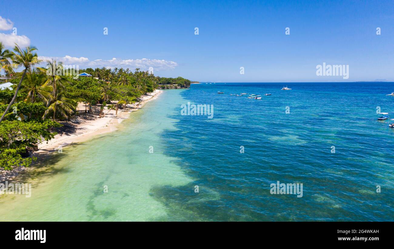 Tropical landscape: beautiful beach and tropical sea. Alona beach ...