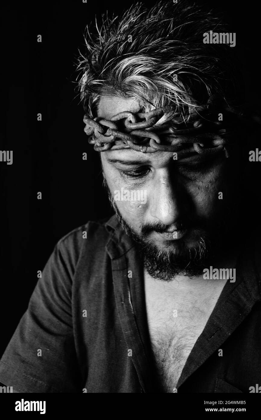 Black and white portrait of a South Asian man posing for a picture ...