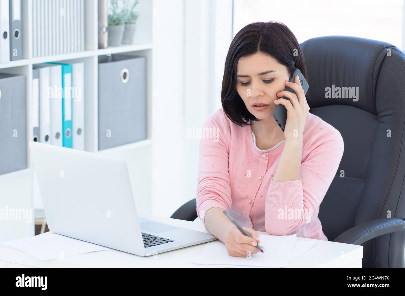 Stylish woman making notes hi-res stock photography and images - Alamy