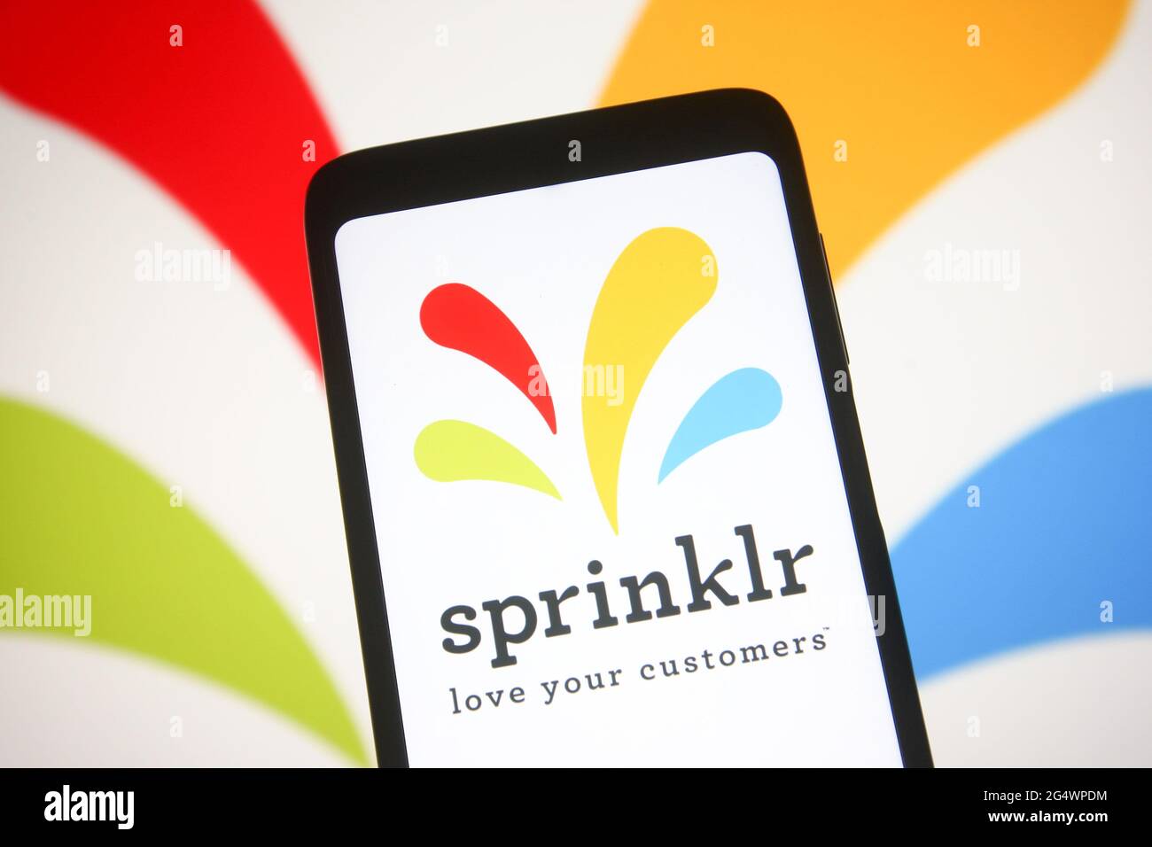In this photo illustration a Sprinklr logo of an US software company is ...