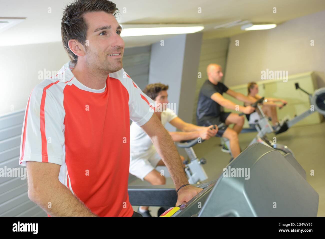Man using fitness machine hi-res stock photography and images - Alamy
