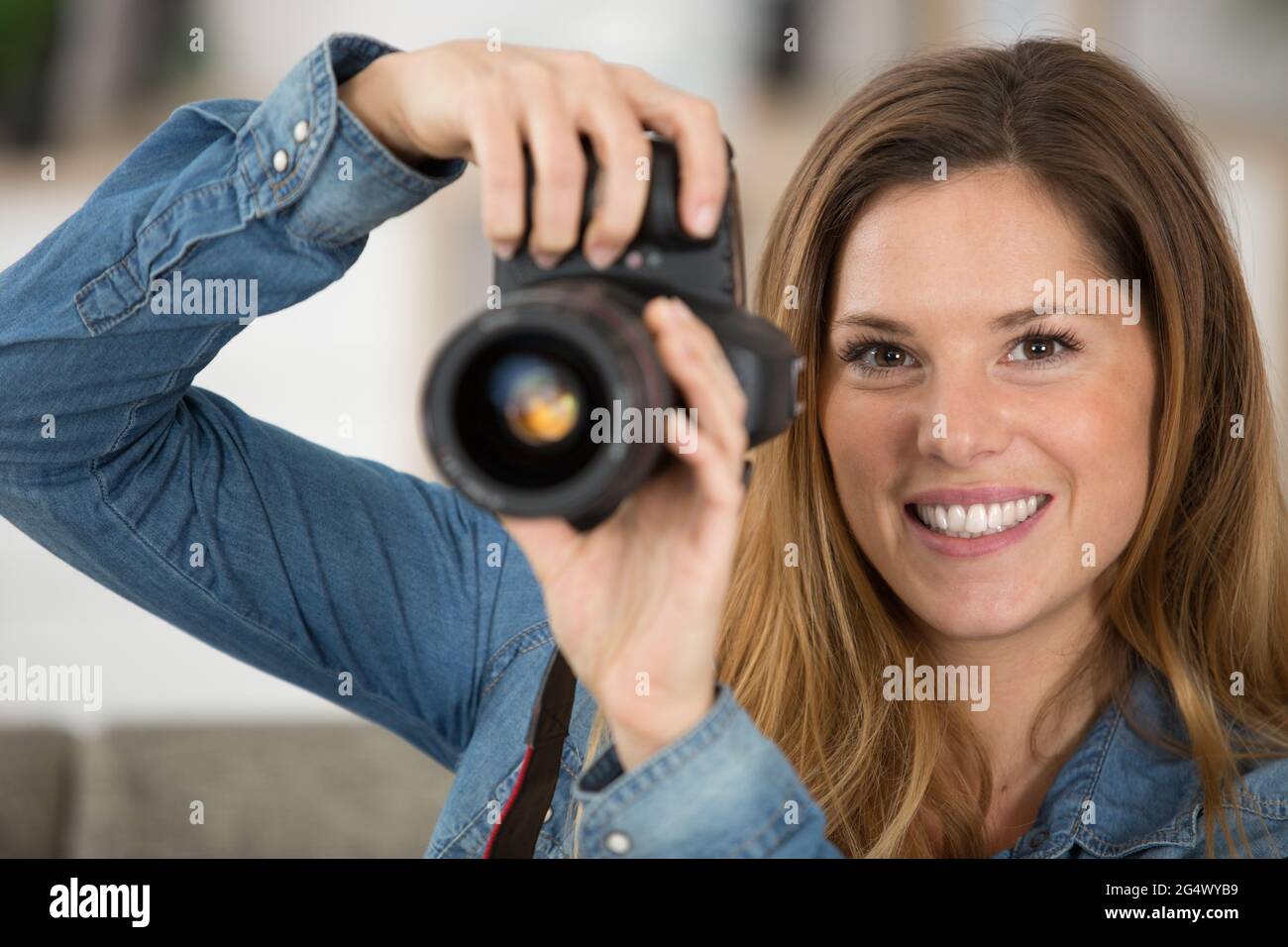 woman talking a photo with dslr photo camera Stock Photo - Alamy