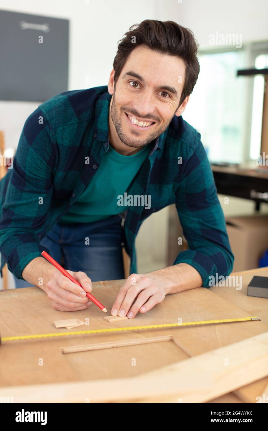 Pencil carpenter hands mark hi-res stock photography and images - Alamy