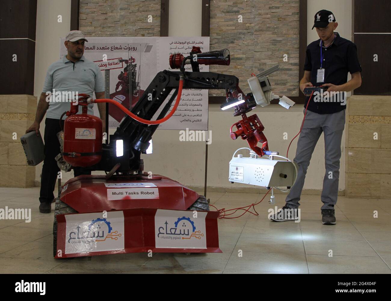 Gaza. 23rd June, 2021. A Palestinian inventor operates a multi-tasking ...