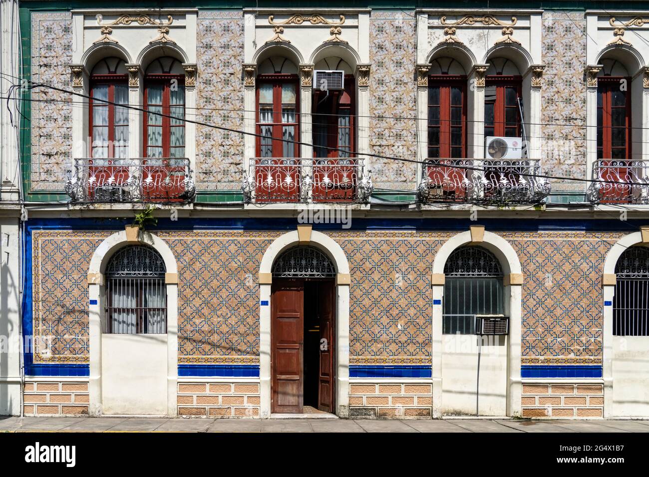 Imported Portuguese tiles decorate dilapidated houses from the Gilded ...