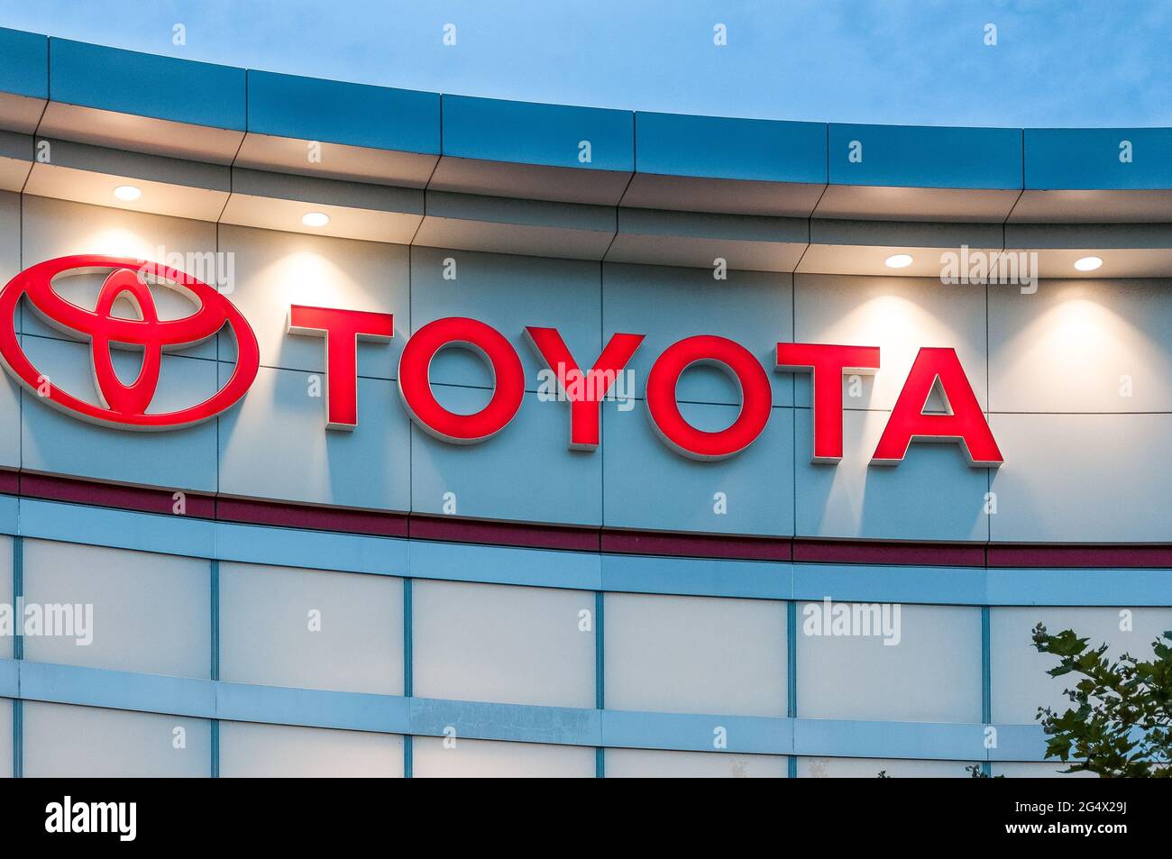 Toyota dealer with interesting architecture at dusk in Toronto city ...