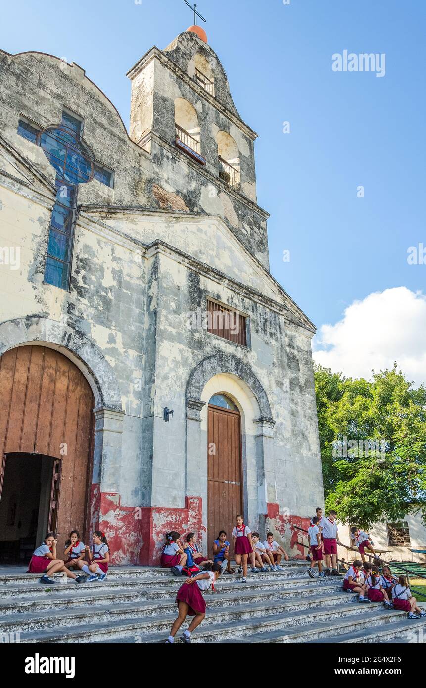 Cuban Pioneers outside La Pastora Church during a break in classes, the ...