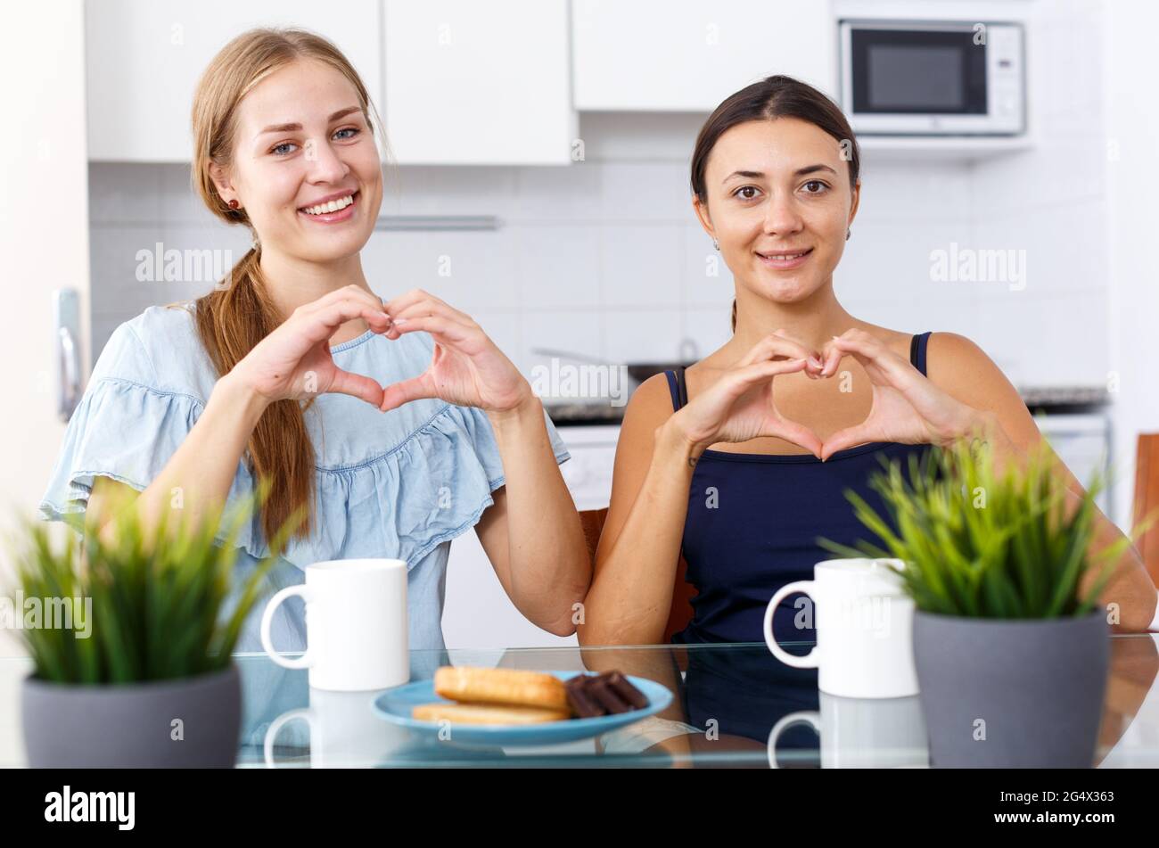 Female friendship relationship gossip hi-res stock photography and ...