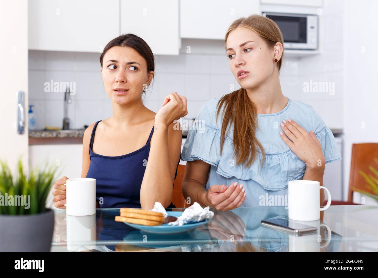 Friend finding out relationship Stock Photo - Alamy