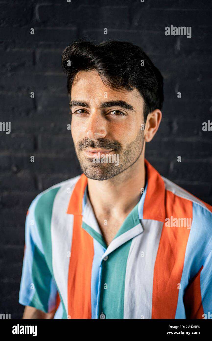 Black coloured colored young man hi-res stock photography and images ...