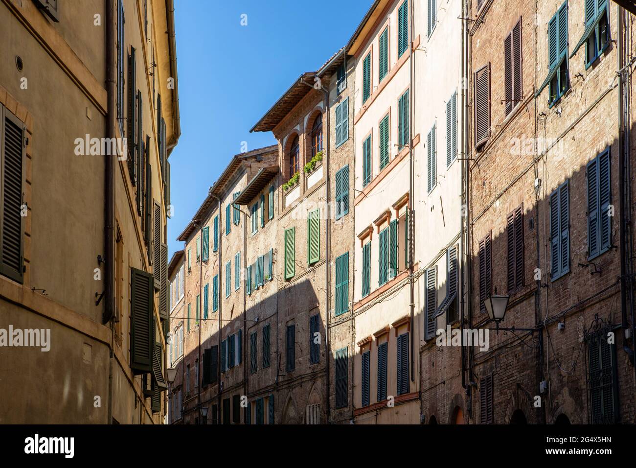 Italy, Tuscany, Siena, Row of historic townhouses Stock Photo - Alamy